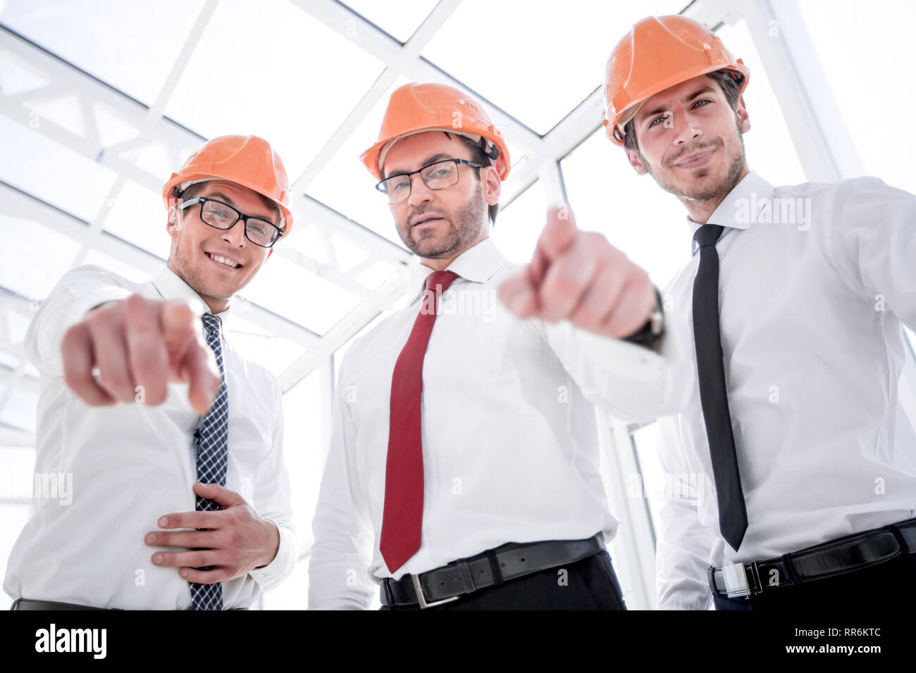group of architects pointing at you Stock Photo - Alamy