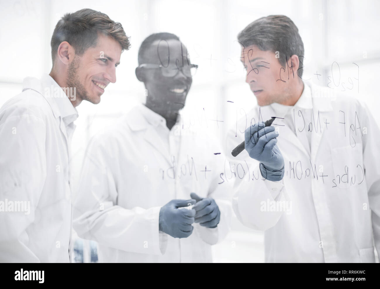 promising scientist makes notes on the Board Stock Photo - Alamy