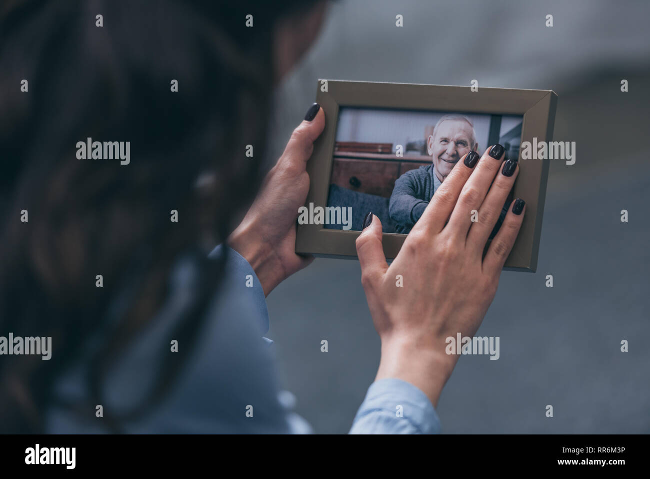 Woman sad photo frame hi-res stock photography and images - Alamy