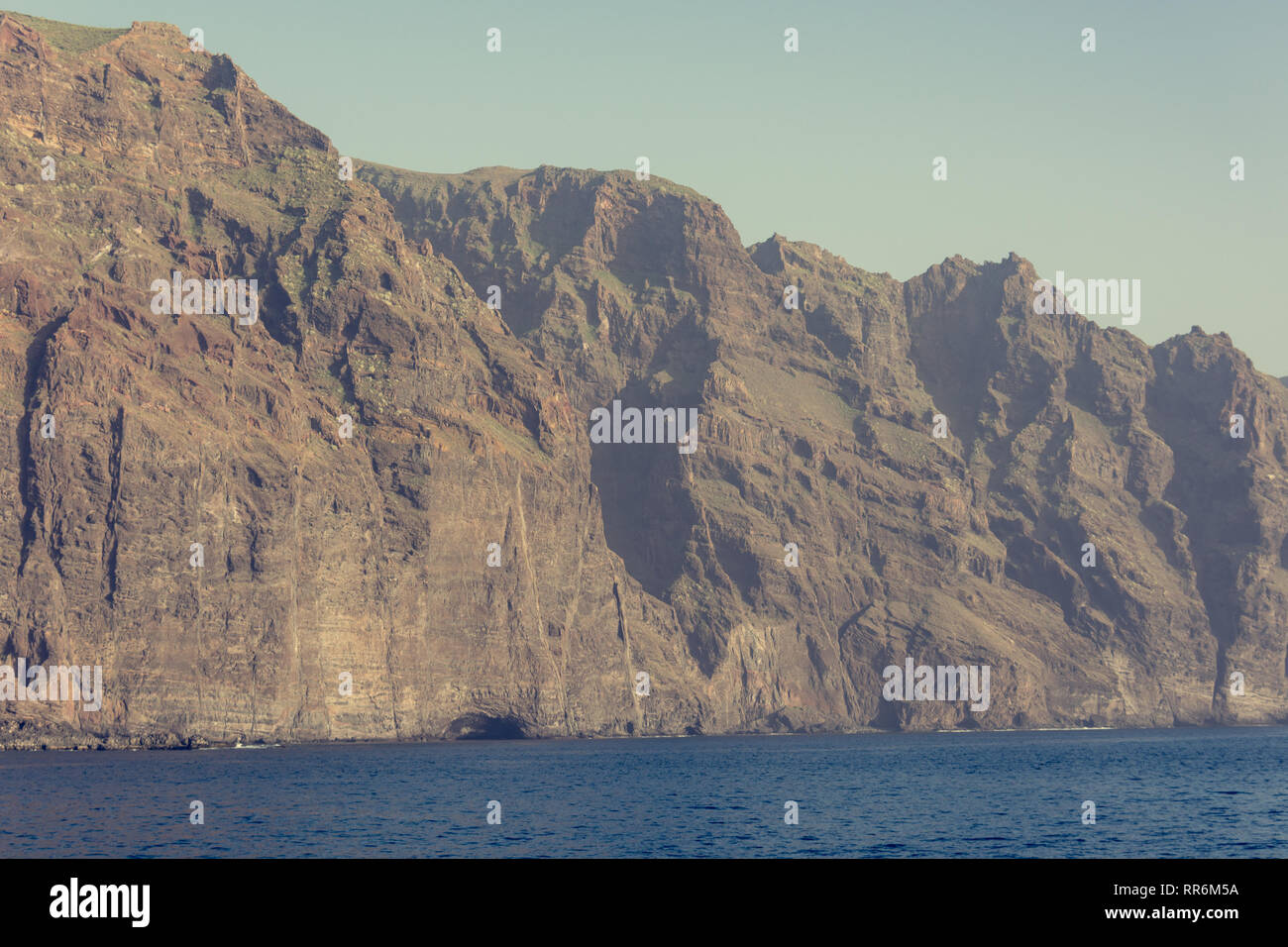 Sheer cliffs of Los Gigantes raising above Atlantic ocean Stock Photo ...