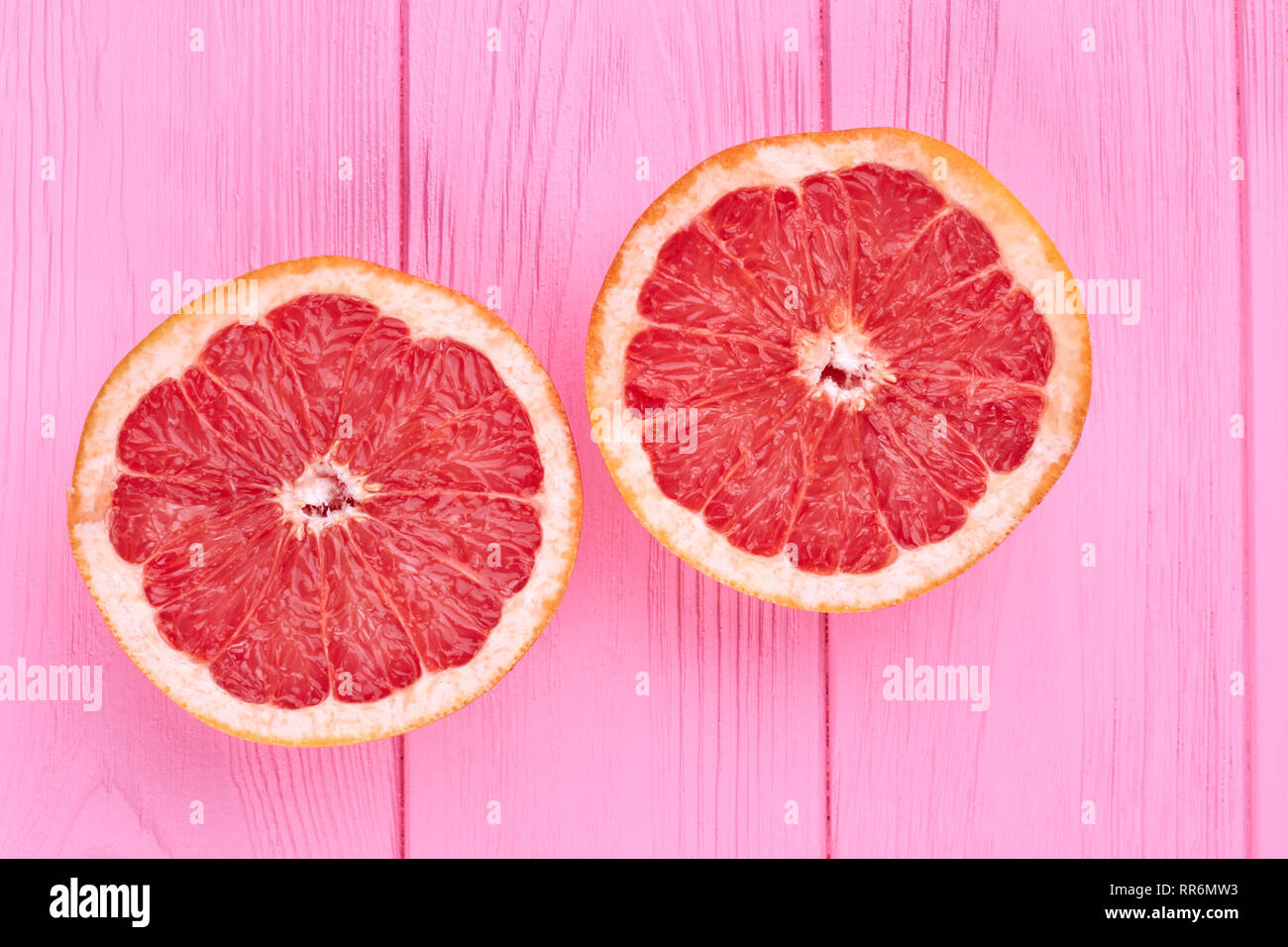Pink grapefruit halves with clipping path Stock Photo - Alamy