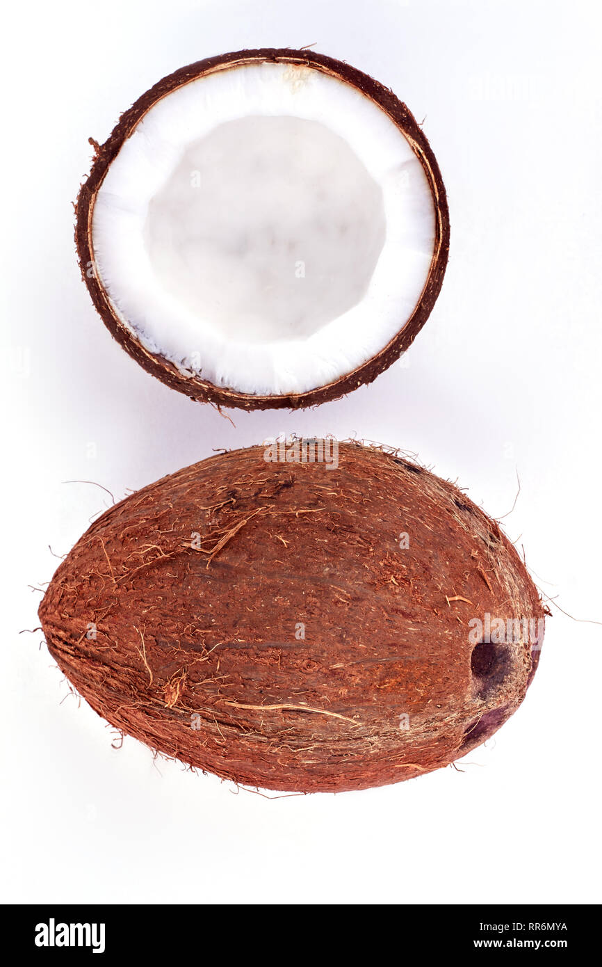 Whole and half coconut, top view Stock Photo - Alamy