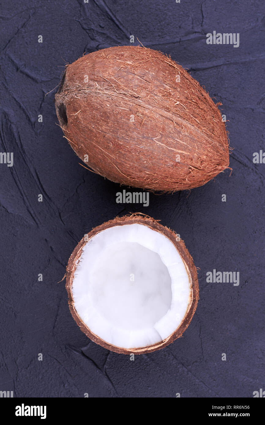 Whole and half of coconut, top view Stock Photo - Alamy