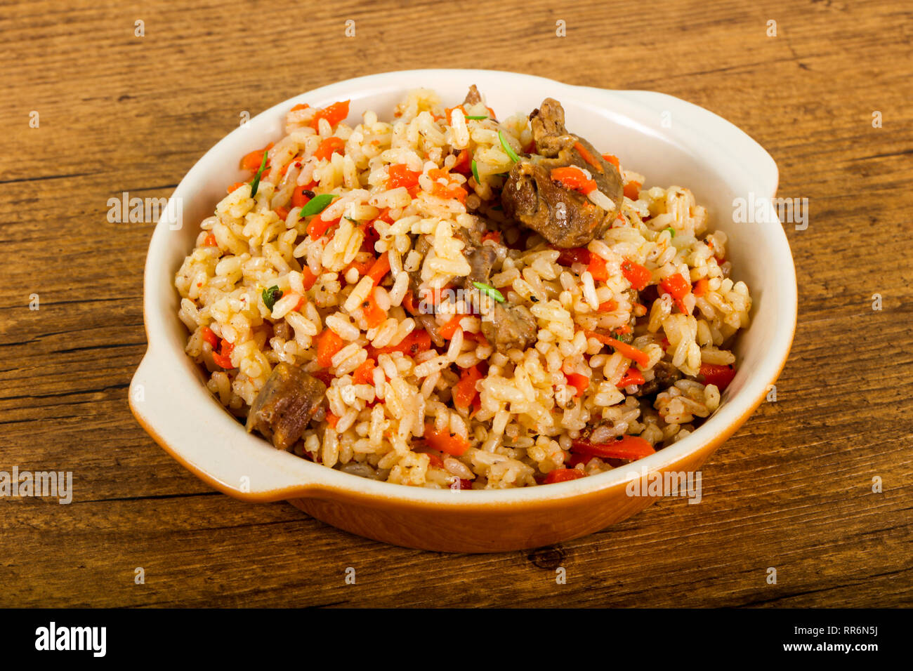 Asian rice - Plov with meat and carrot Stock Photo - Alamy