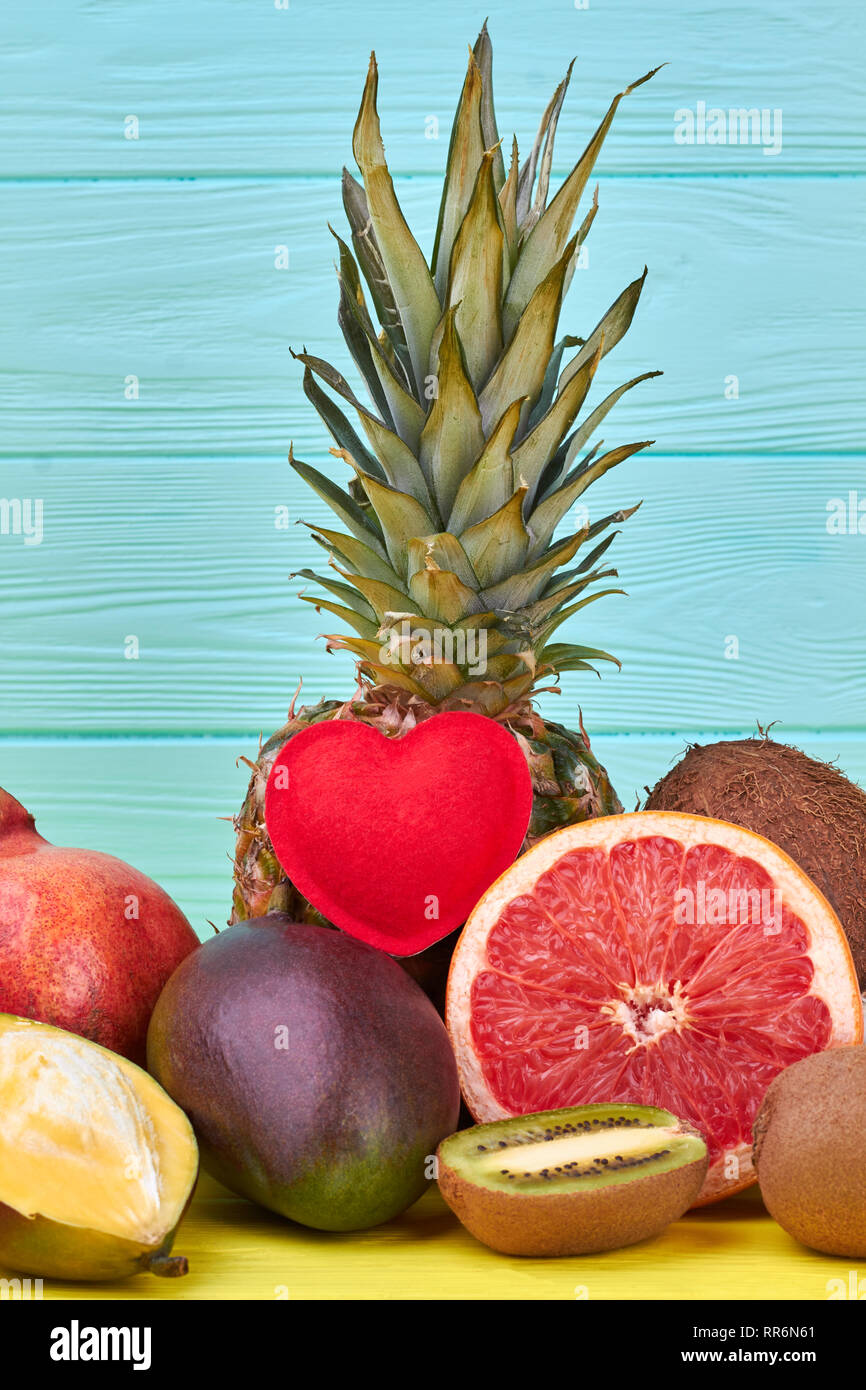 Healthy tropical fruits, vertical image Stock Photo - Alamy