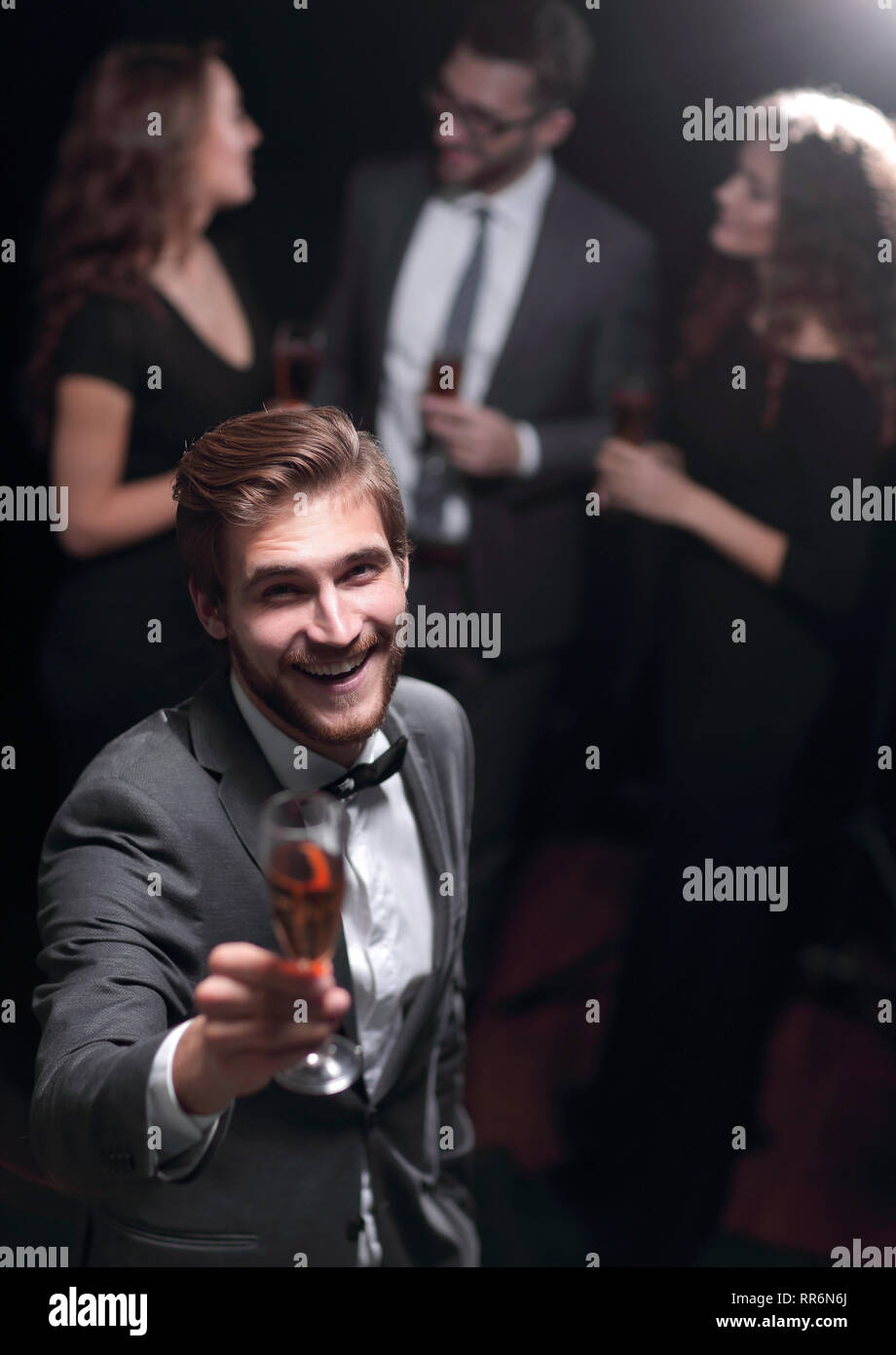Hand raising a glass hi-res stock photography and images - Alamy