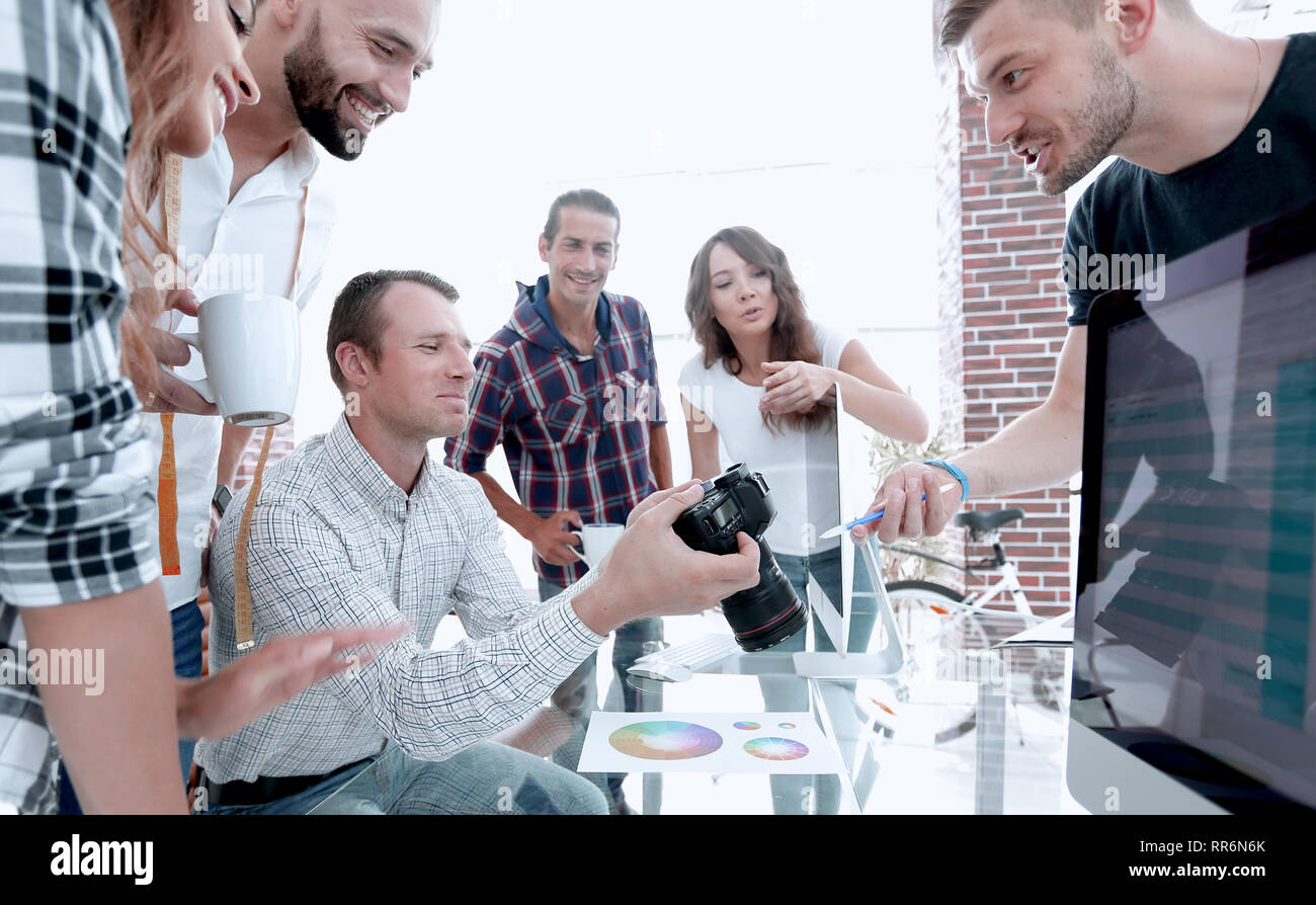 group photo of editors working in a modern office Stock Photo - Alamy