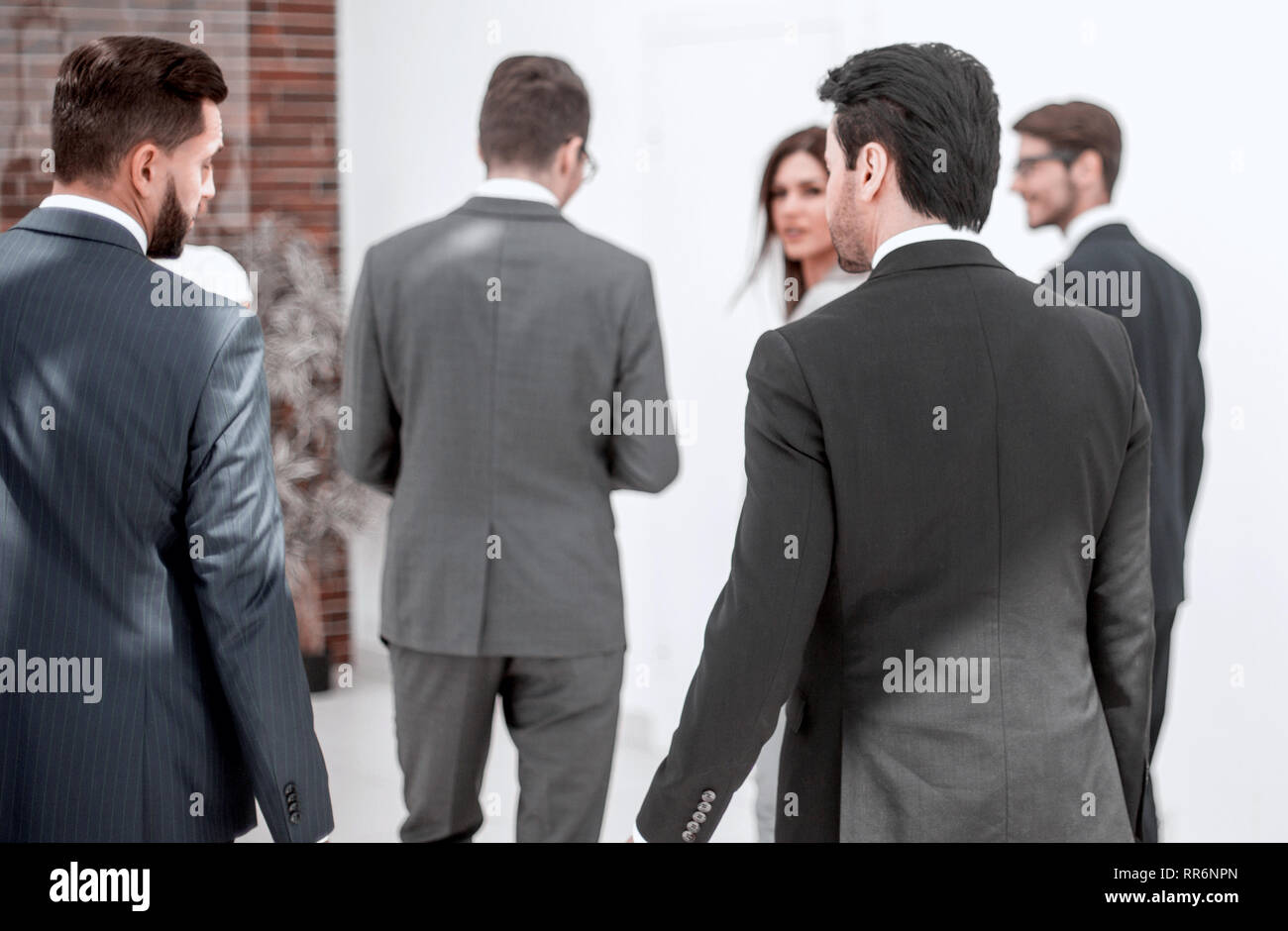 rear view.a group of business people in the business center Stock Photo ...