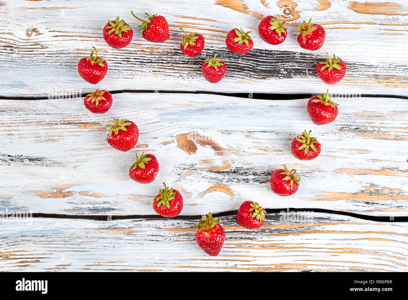 Shape of heart from fresh strawberries Stock Photo - Alamy