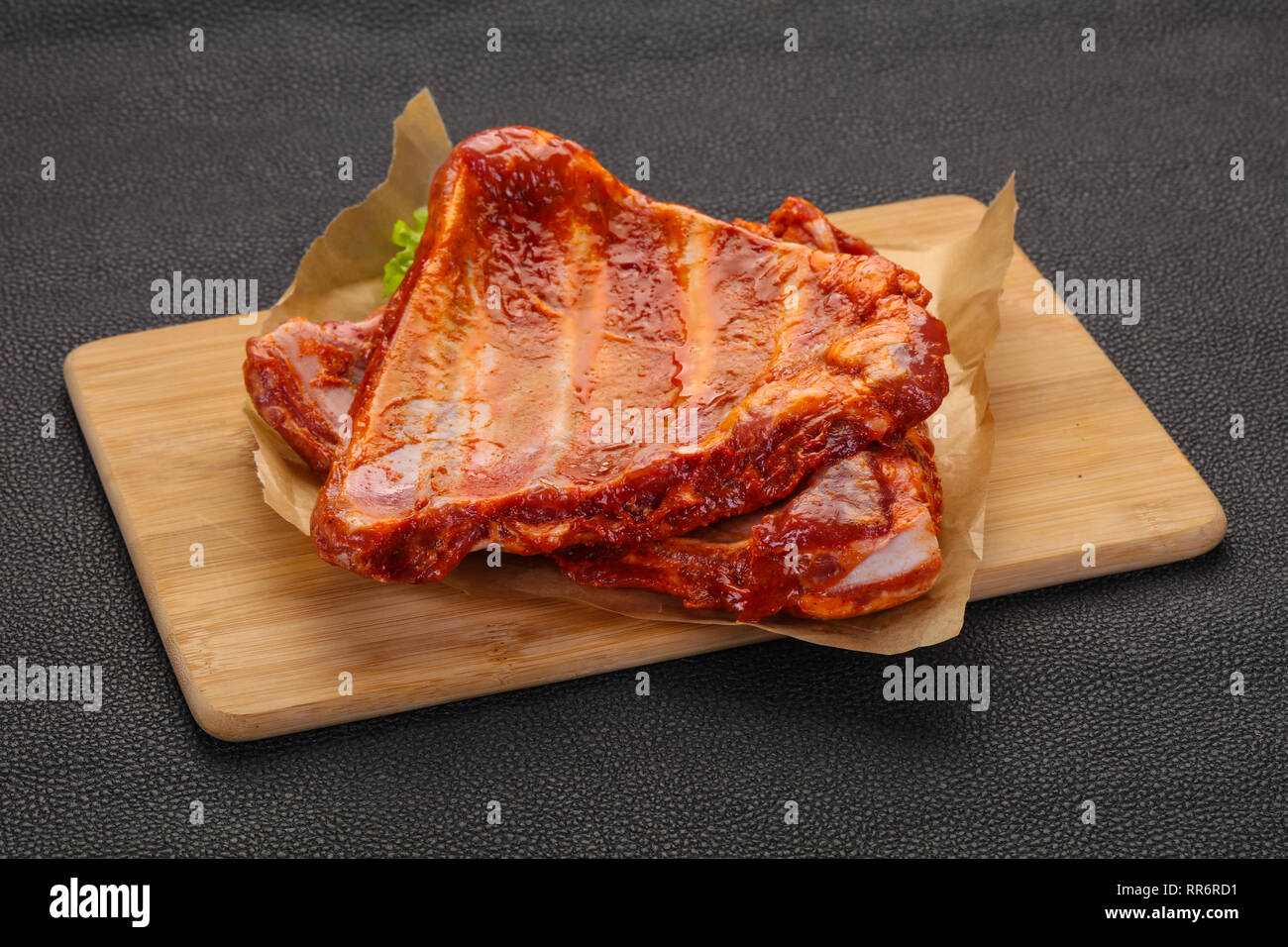 Raw marinated pork ribs ready for cooking Stock Photo - Alamy