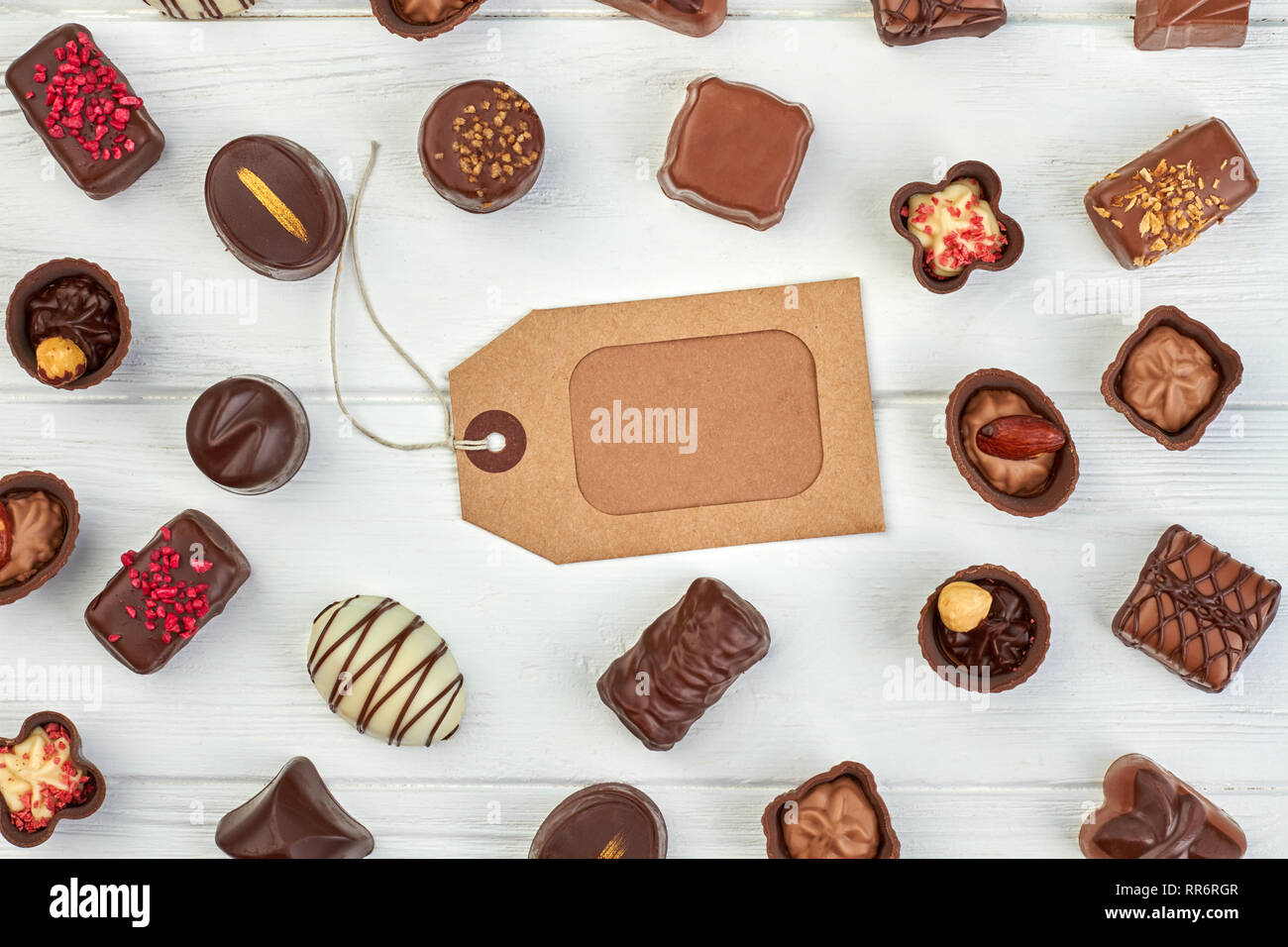 Assorted chocolate candies and price tag Stock Photo - Alamy