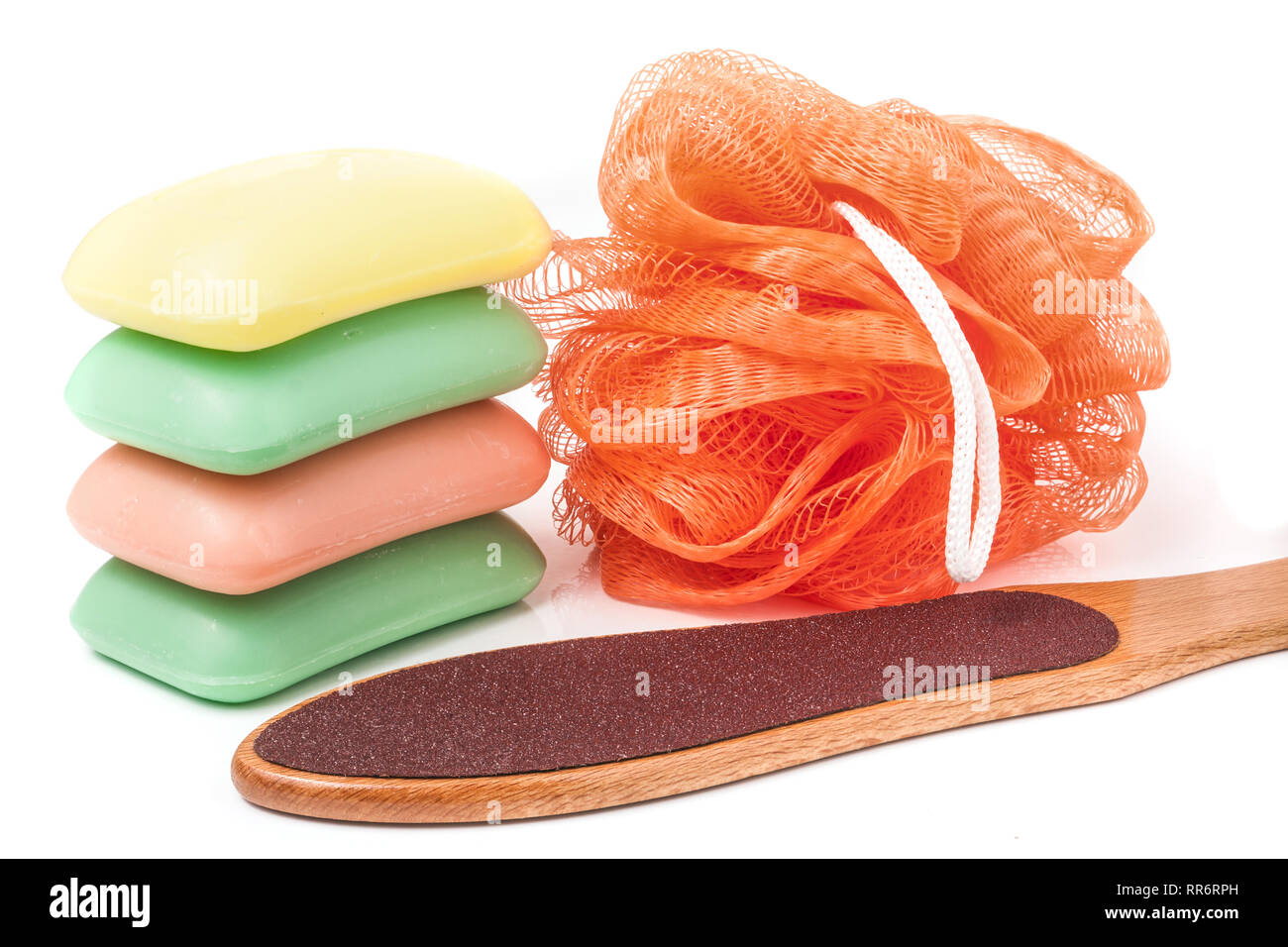 sponge shower with grater for feet and soap isolated on white ...