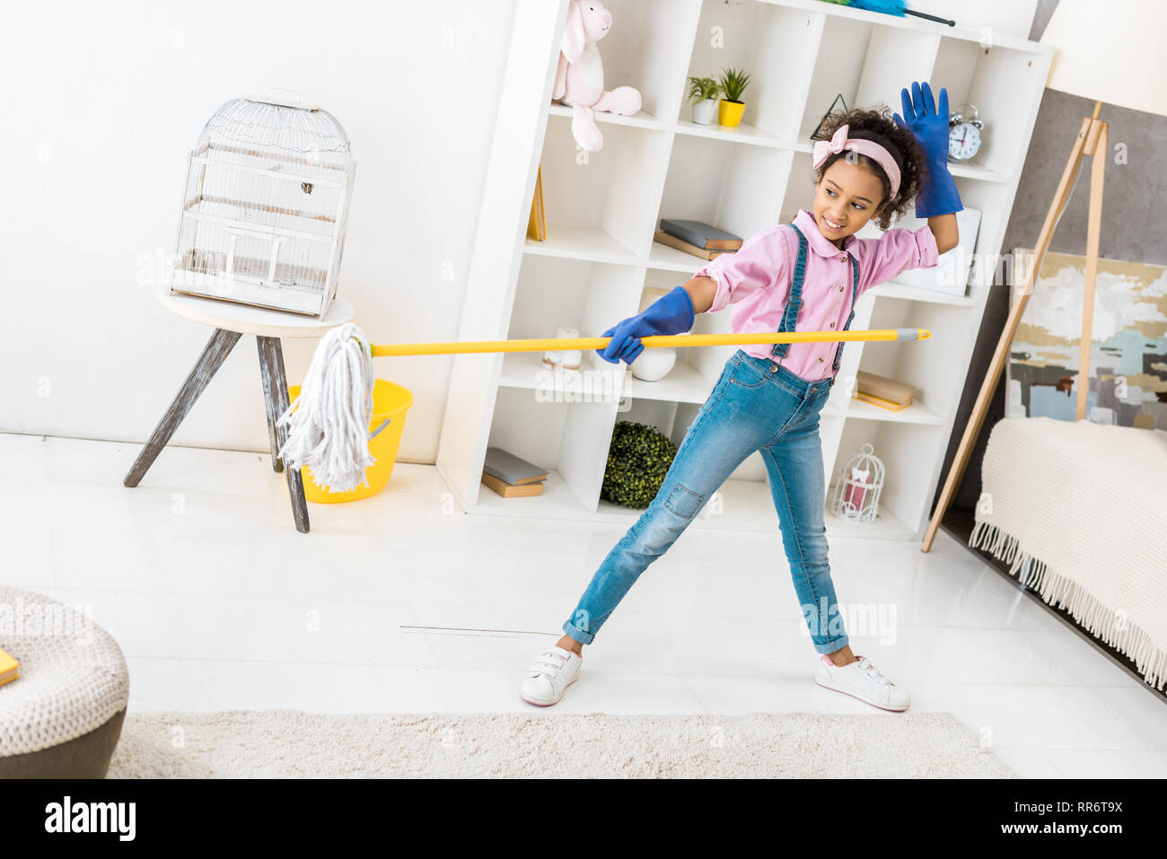 Cheerful african female pink shirt hi-res stock photography and images ...