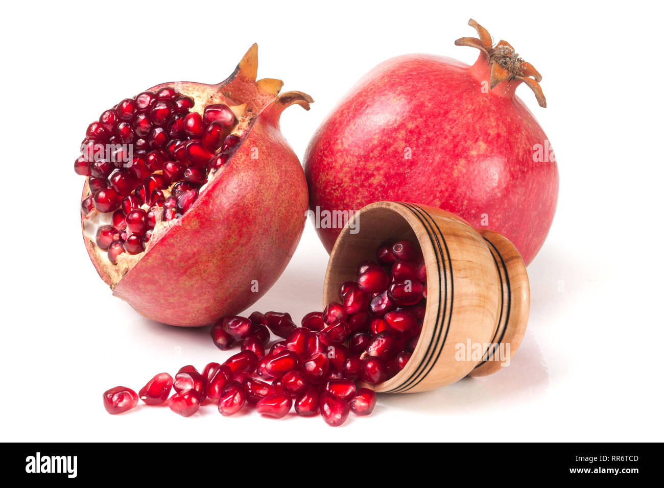 two pomegranate isolated on a white background Stock Photo - Alamy