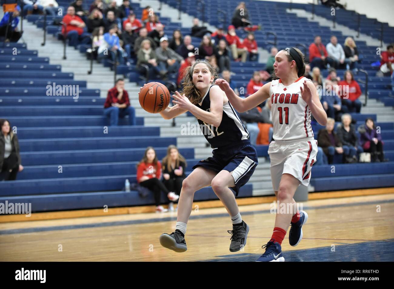 Basketball player dribbling in gym hi-res stock photography and images ...
