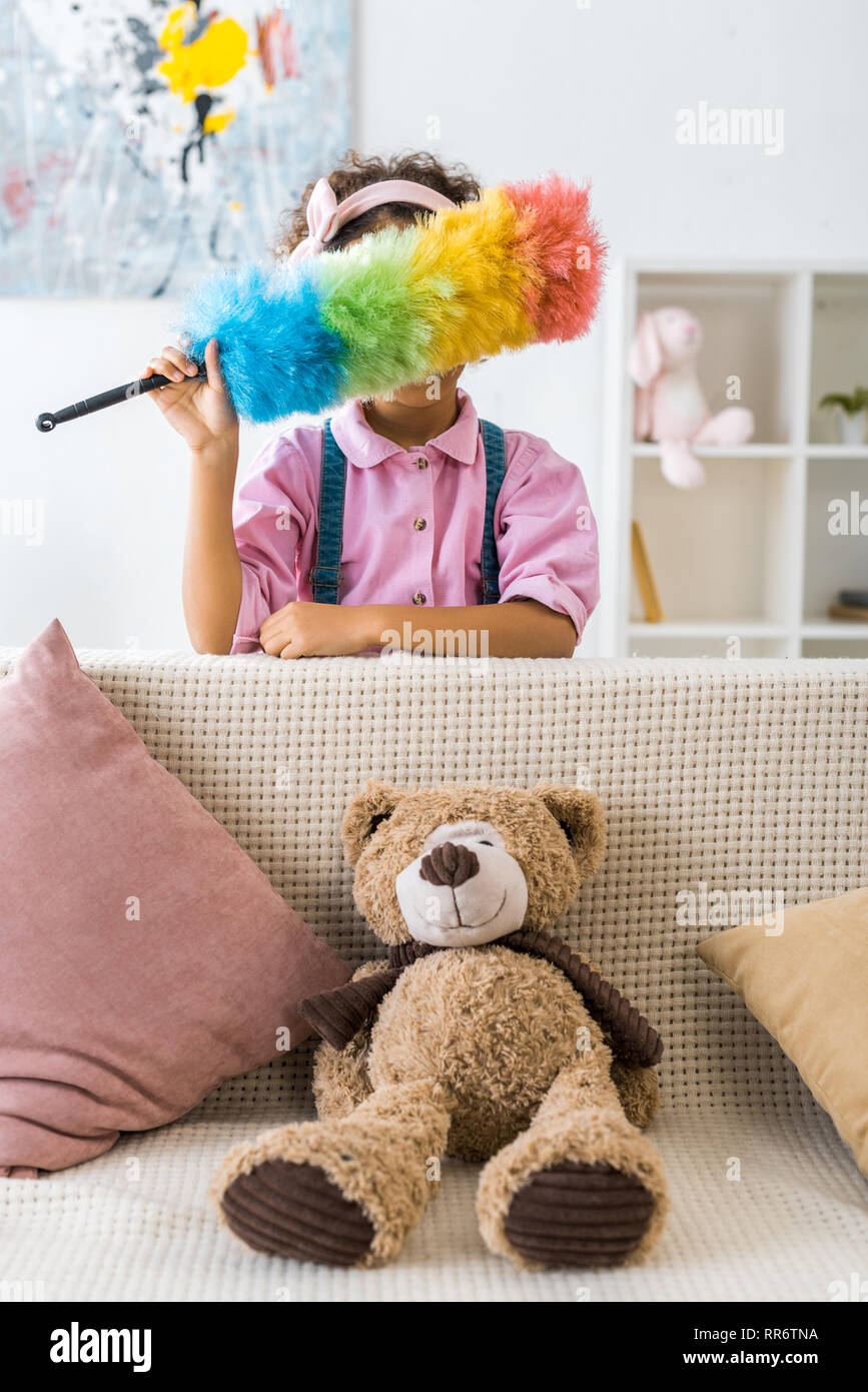 Child hiding face hi-res stock photography and images - Alamy