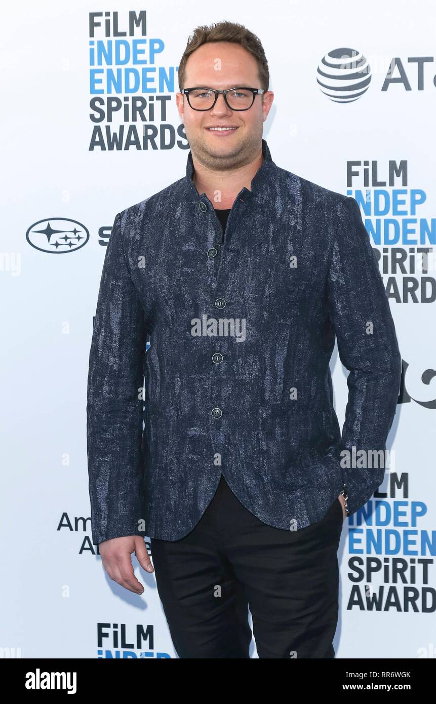 Sam Slater arrives at the Film Independent Spirit Awards in a tent in ...