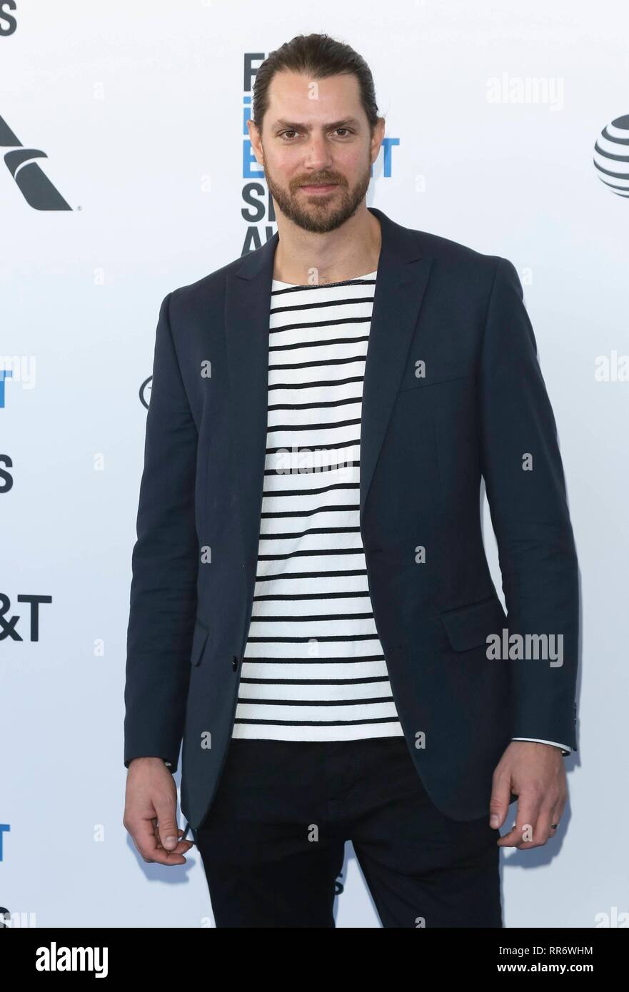 Zak Mulligan arrives at the Film Independent Spirit Awards in a tent in ...