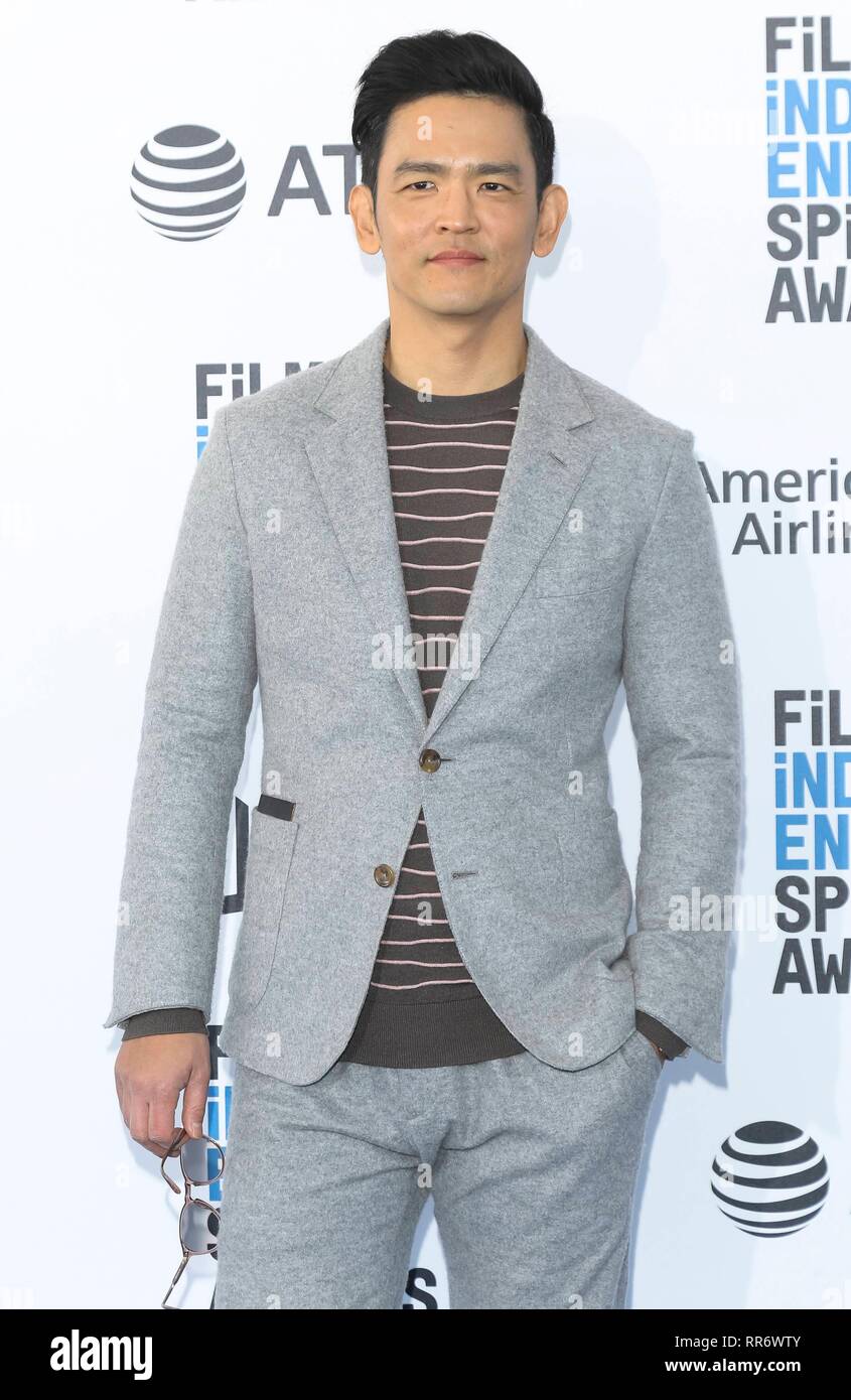 John Cho arrives at the Film Independent Spirit Awards in a tent in ...