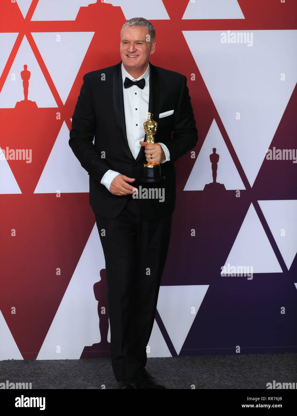 Los Angeles, USA. 24th Feb, 2019. John Ottman poses for photos after ...