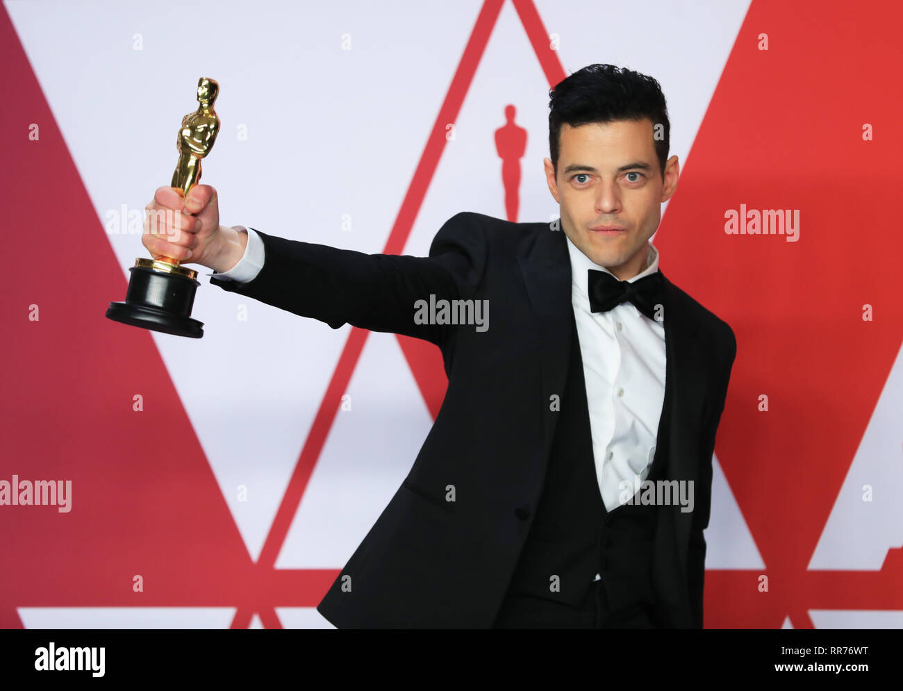Los Angeles, USA. 24th Feb, 2019. Rami Malek poses for photos after ...