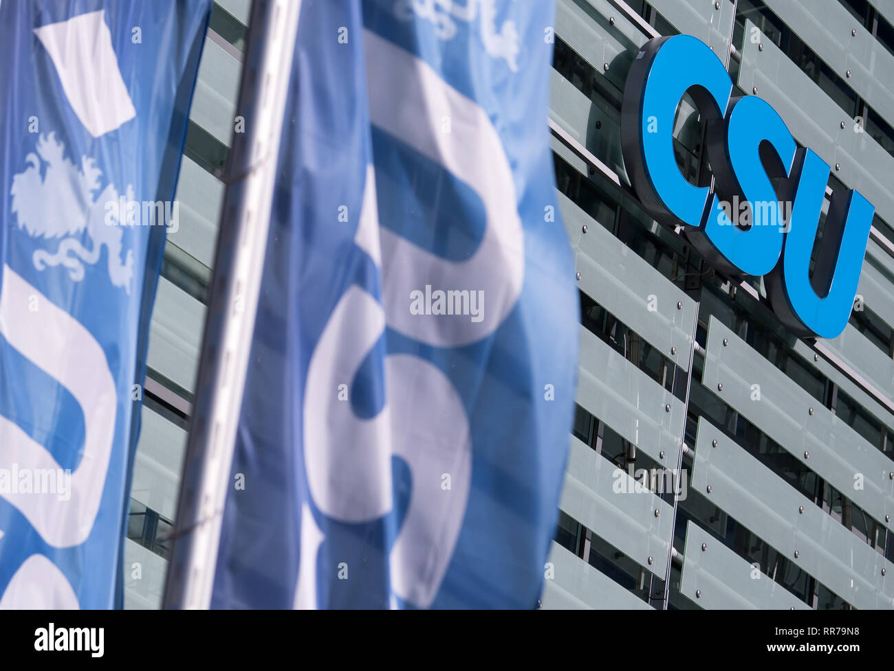 25 February 2019, Bavaria, München: Flags with the CSU logo stand in ...