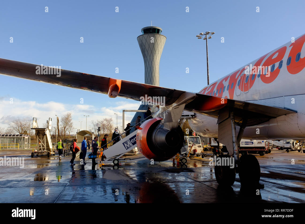 Passengers boarding an easyjet plane at Edinburgh airport viewed from ...