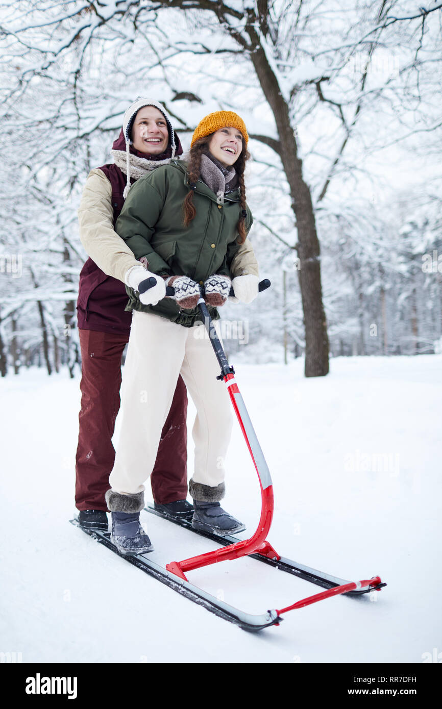 Couple Riding Sleigh Stock Photo - Alamy