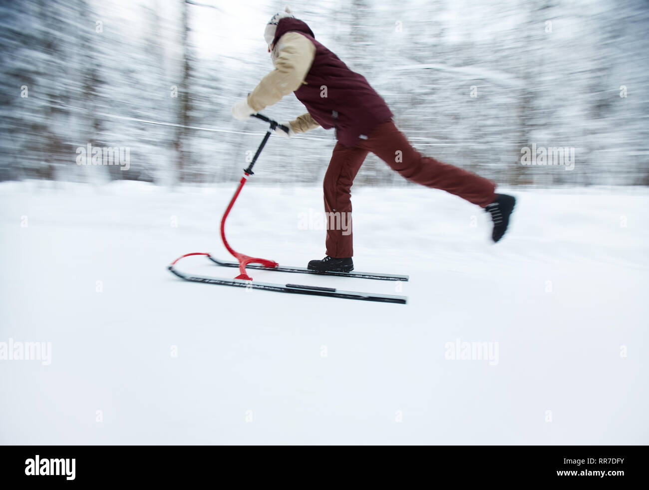 Guy Riding Sleigh Stock Photo - Alamy