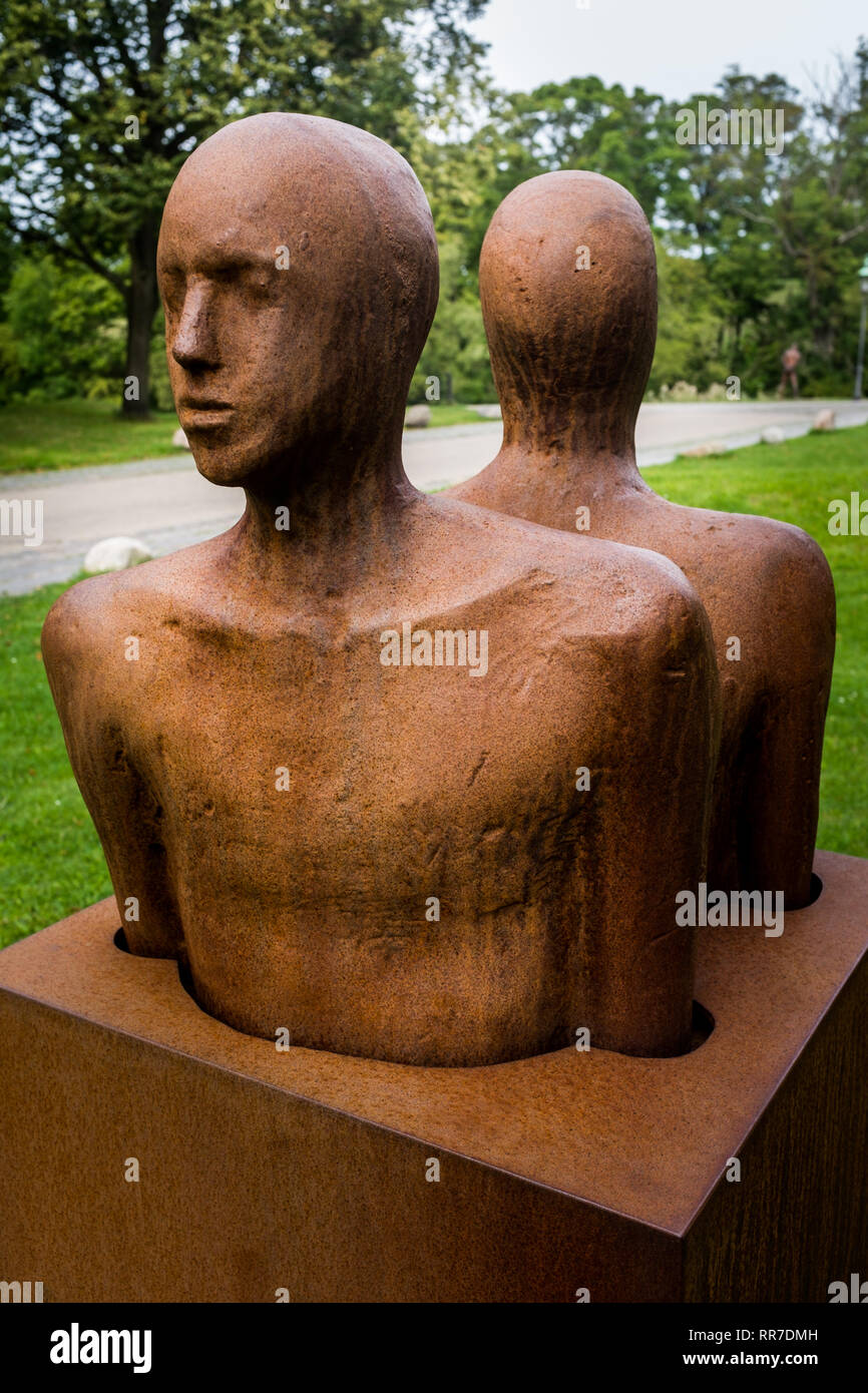 Street art sculpture installation of rusty figures bust Copenhagen ...