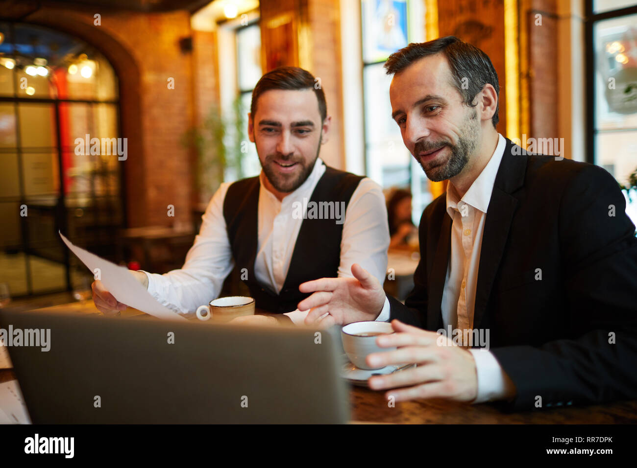 Business people Working in Restaurant Stock Photo - Alamy