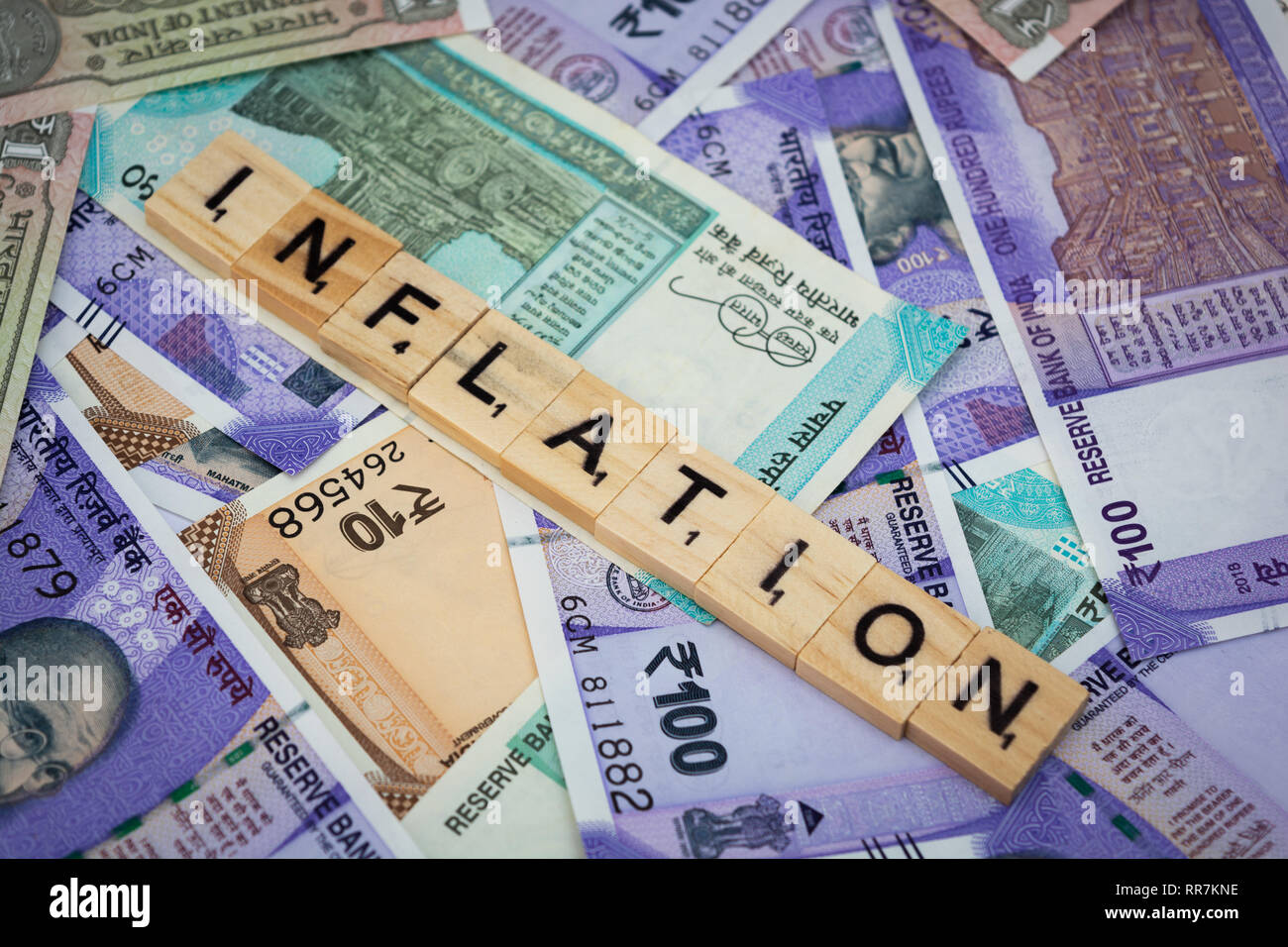 Concept of Inflation word on Indian currency Notes Stock Photo - Alamy