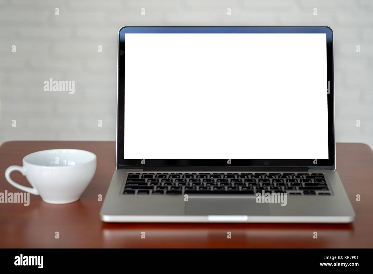 mock up Using laptop with blank screen computer modern Stock Photo - Alamy