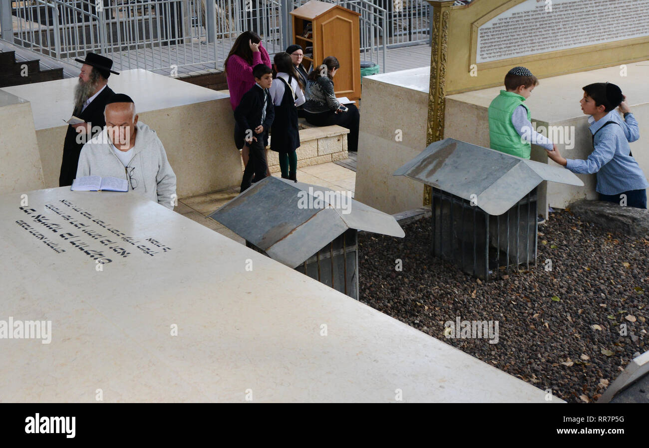 Jewish pilgrims pray at the Tomb of Maimonides in Tiberias, Israel ...