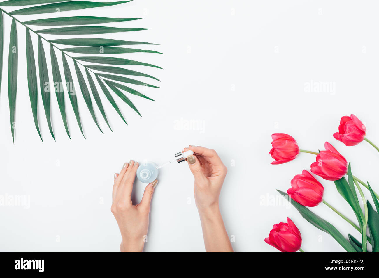 Womans hands apply serum from hi-res stock photography and images - Alamy