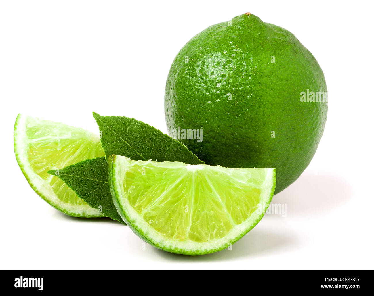 lime with slices and leaf isolated on white background Stock Photo - Alamy