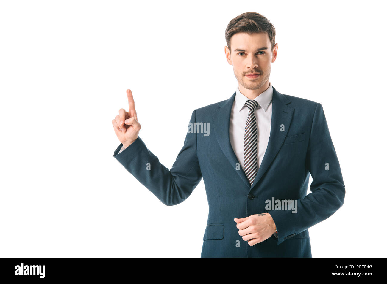 handsome businessman in suit pointing up isolated on white Stock Photo ...