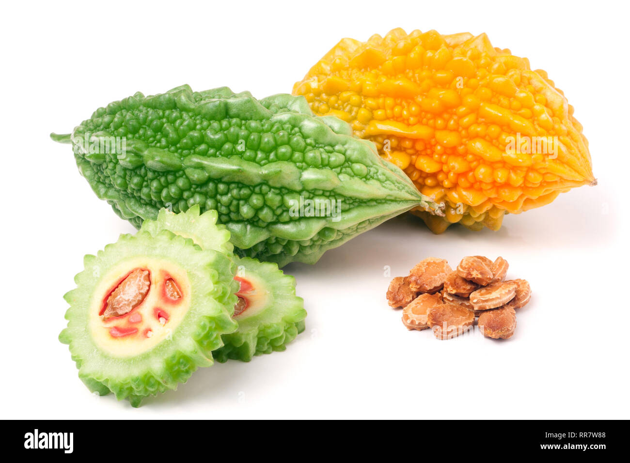 green and yellow bitter melon or momordica isolated on white background ...