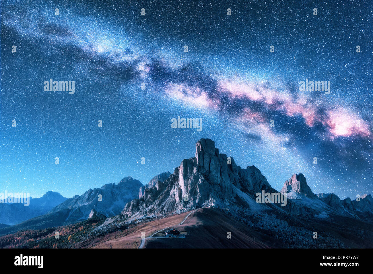 Milky Way above mountains at night in summer. Landscape with alpine ...