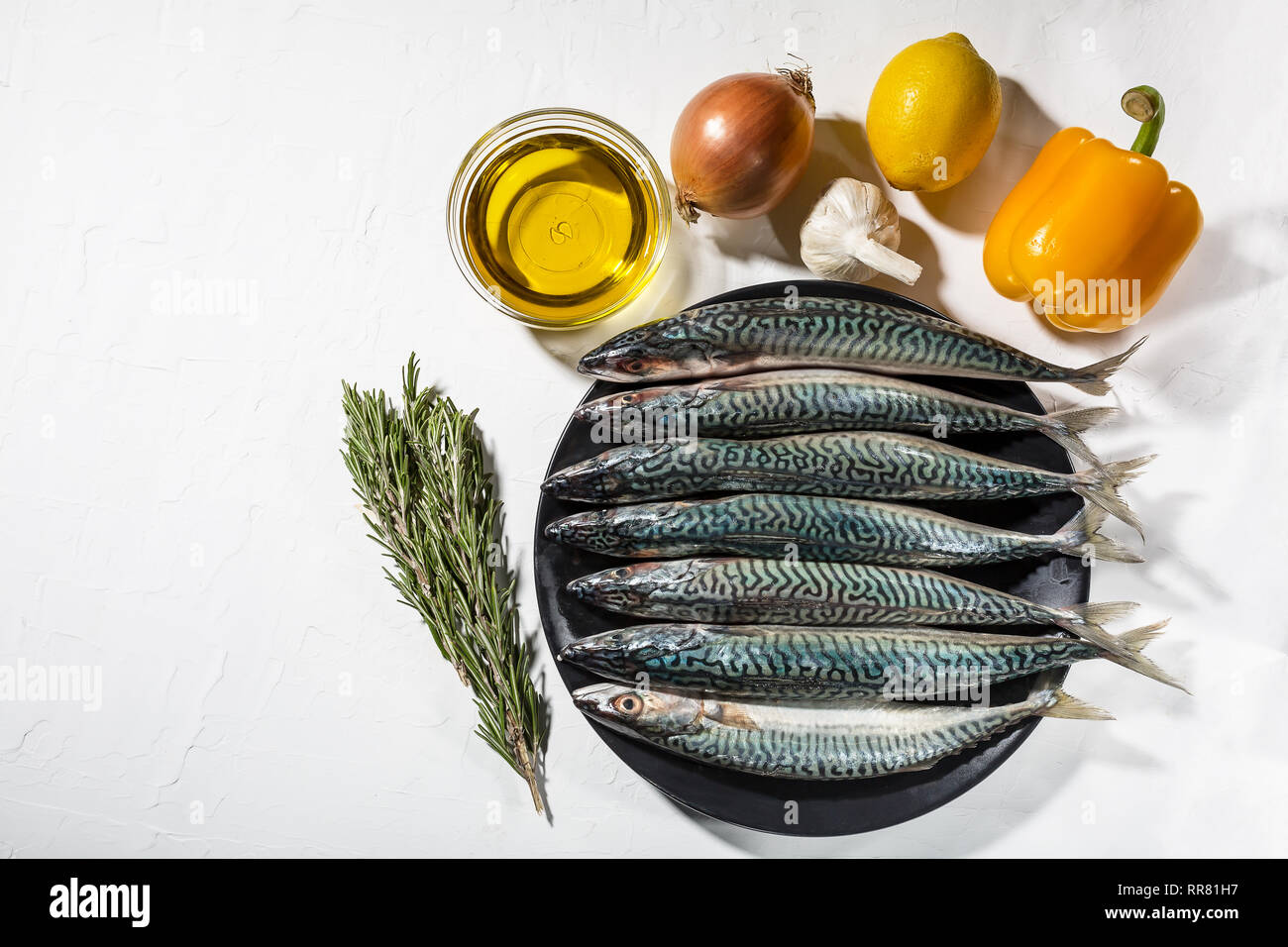 Background of healthy food with blue fish and vegetables and superfood ...