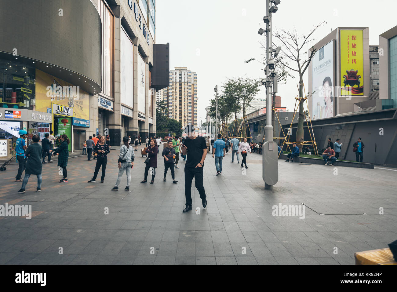 Shenzhen, China, Feb, 21, 2019: People walking at promenade at ...
