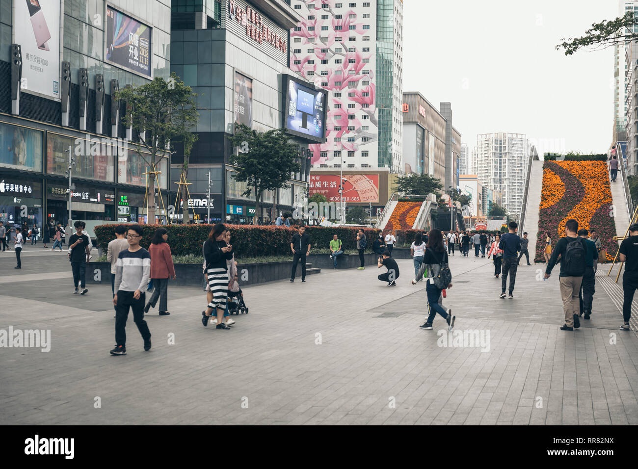 Shenzhen, China, Feb, 21, 2019: People walking at promenade at ...