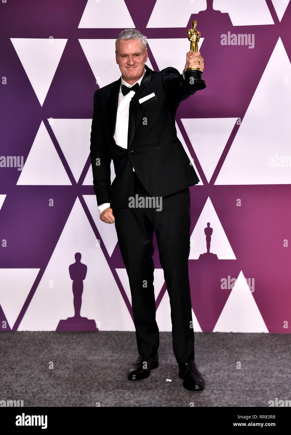 John Ottman with the award for Film Editing for Bohemian Rhapsody in ...