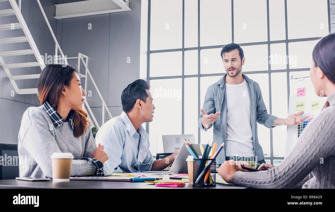 Creative director team lead brainstrom branding project with designer ...