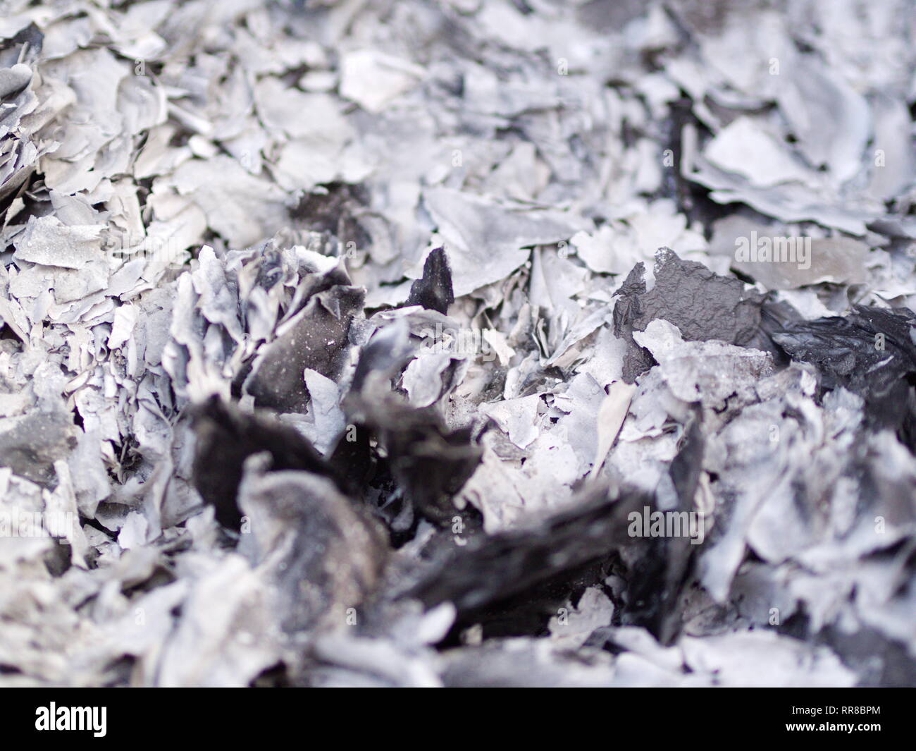 Close up ashes and cinders from ghost money paper burning for Ancestor ...