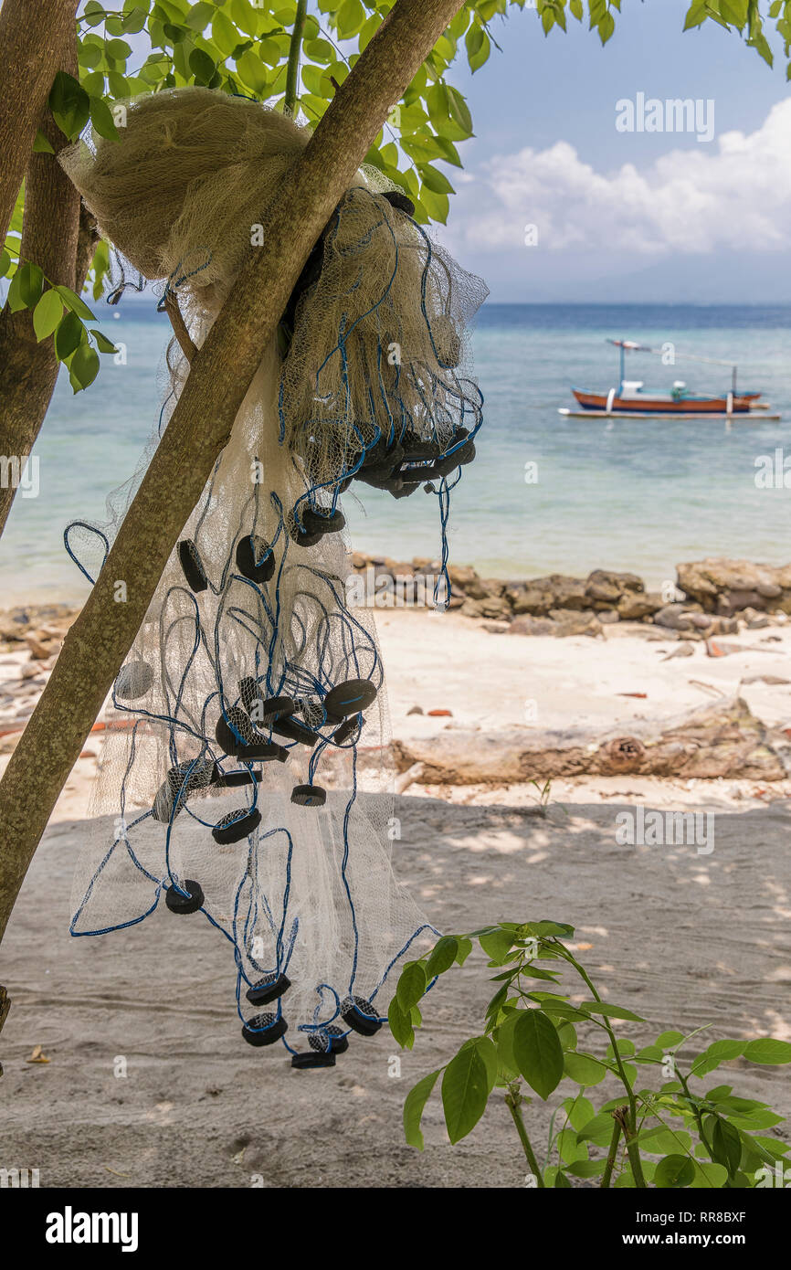 Fishing nets on the beach, gili meno island, Indonesia Stock Photo - Alamy