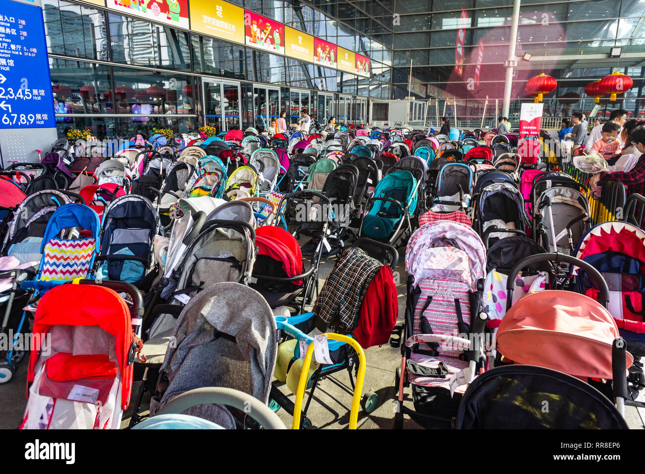 Baby prams and carriages parked outside at a big event in Shenzhen ...