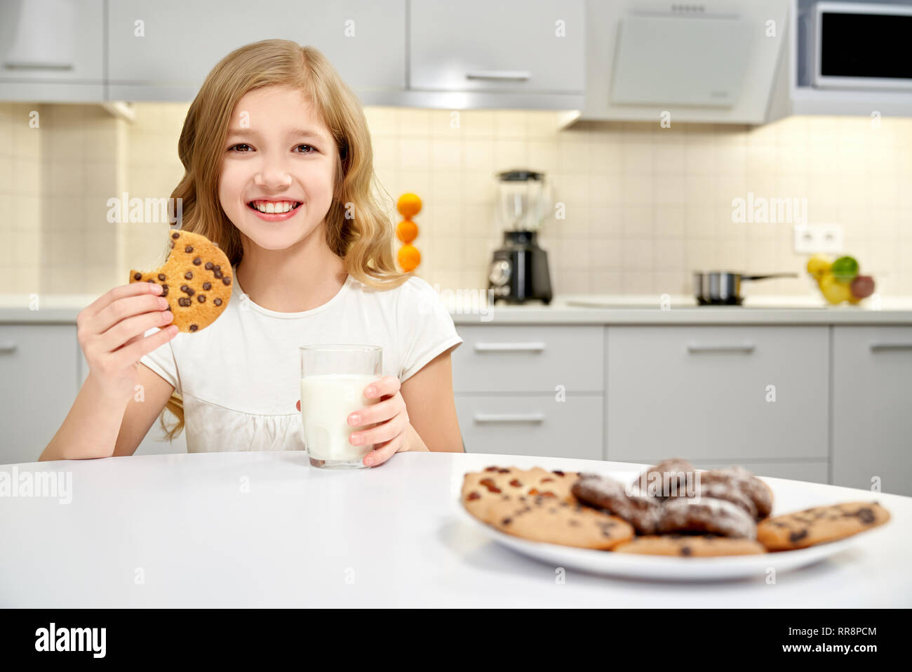 Girl eating raisins hi-res stock photography and images - Alamy