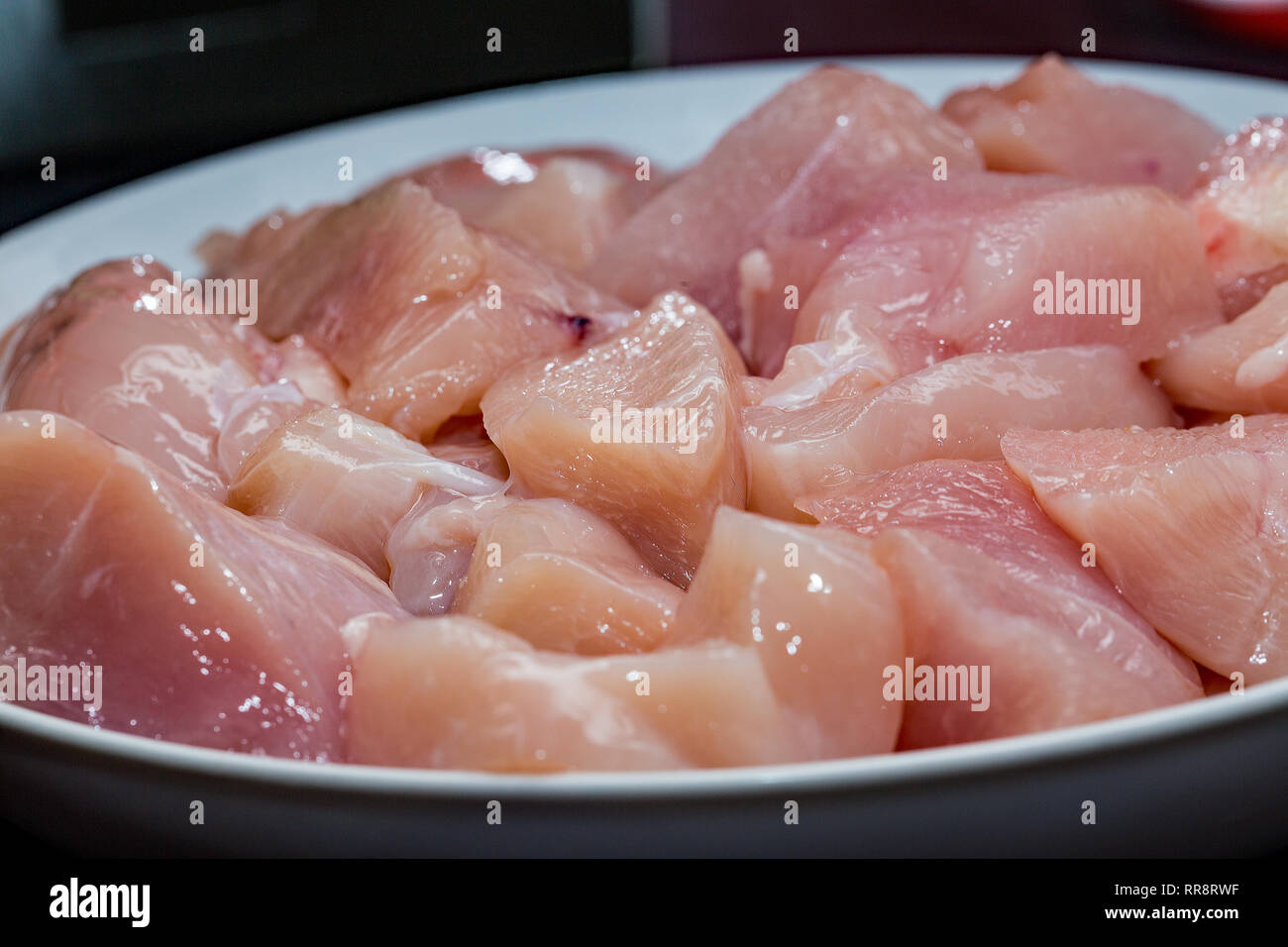 Chopped raw chicken pieces hi-res stock photography and images - Alamy