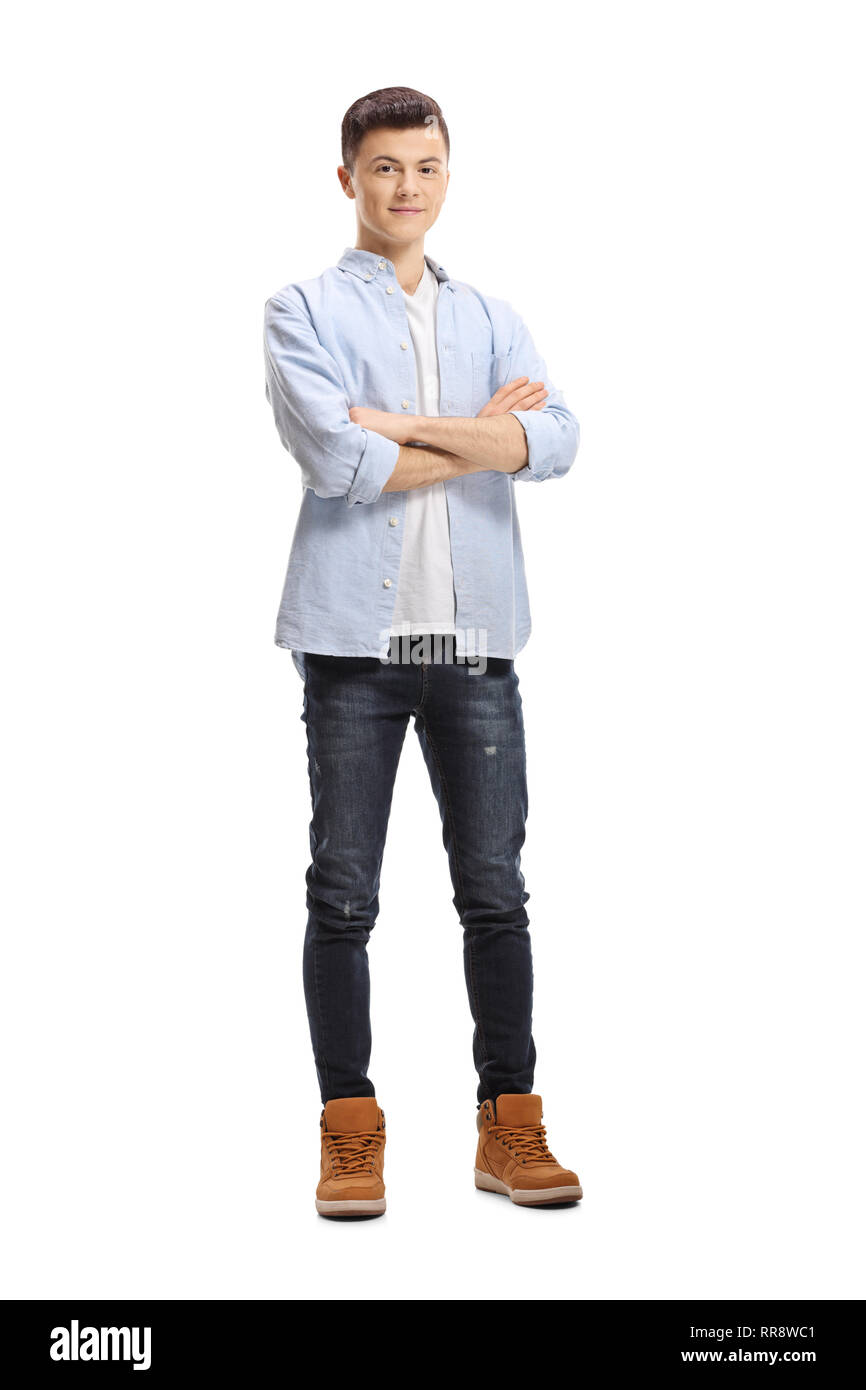 Full length portrait of a young male posing with crossed arms isolated ...